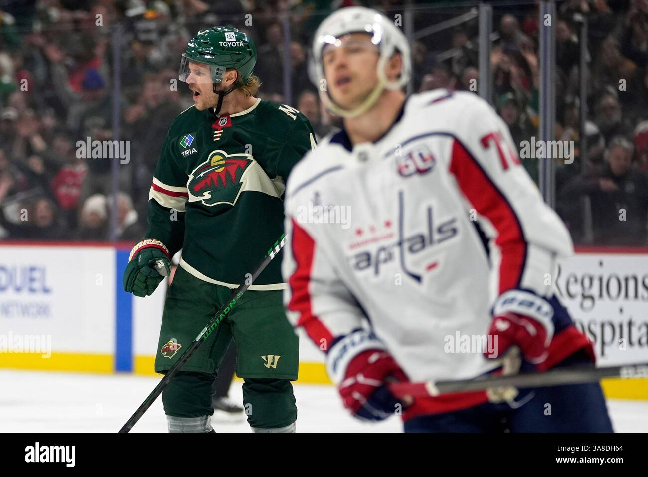 Minnesota Wild defenseman Jon Merrill (4) celebrates after scoring a ...