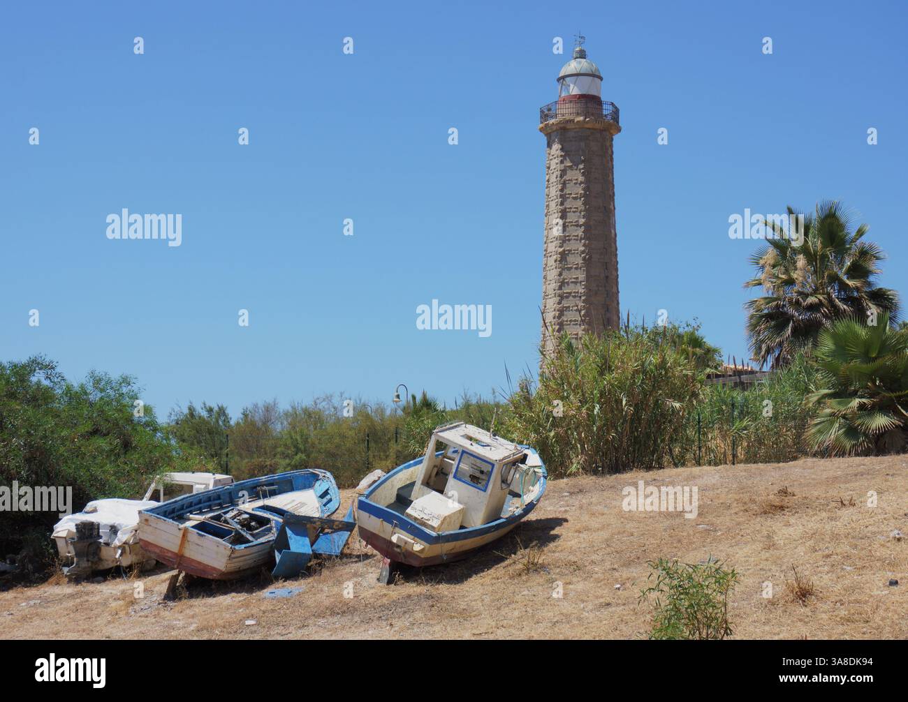 The Faro de Punta Doncella, a 22-meter lighthouse marking the port of ...