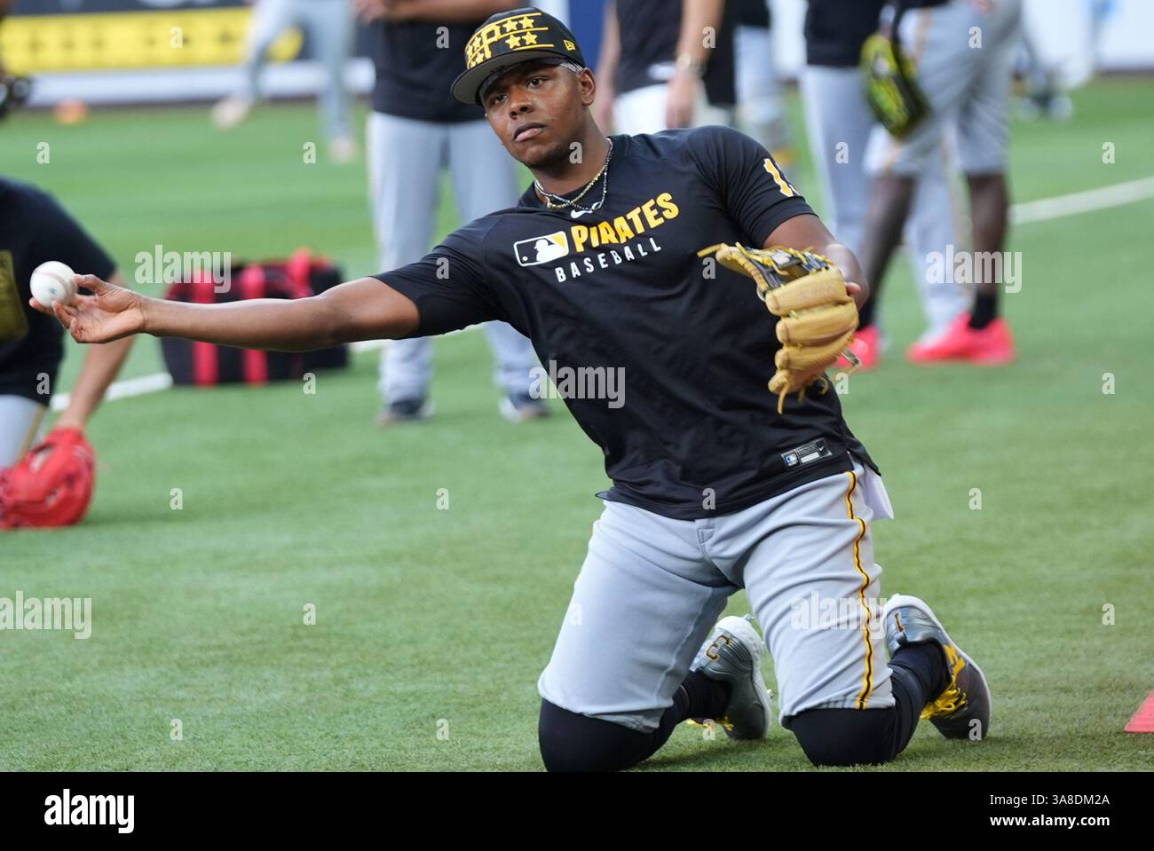 Pittsburgh Pirates third base Ke'Bryan Hayes does drills before a ...