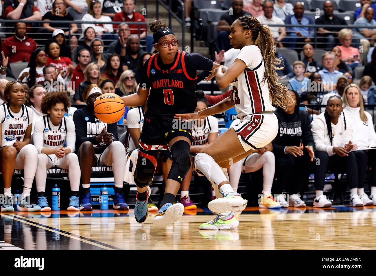 Maryland guard Shyanne Sellers (0) drives the baseline around South ...