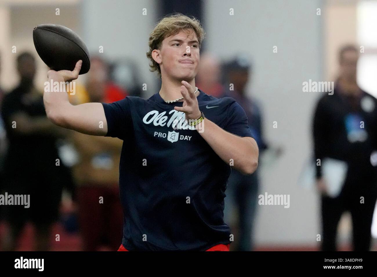 Mississippi quarterback Jaxson Dart looks to pass a ball during an ...