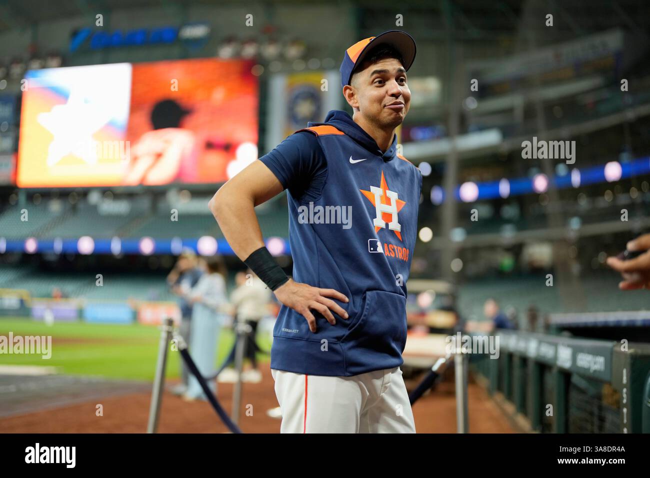 Houston Astros' Mauricio Dubón waits outside the dugout during batting ...