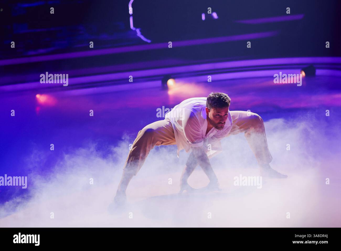 Cologne, Germany. 28th Mar, 2025. Marc Eggers, model, and Renata Lusin ...