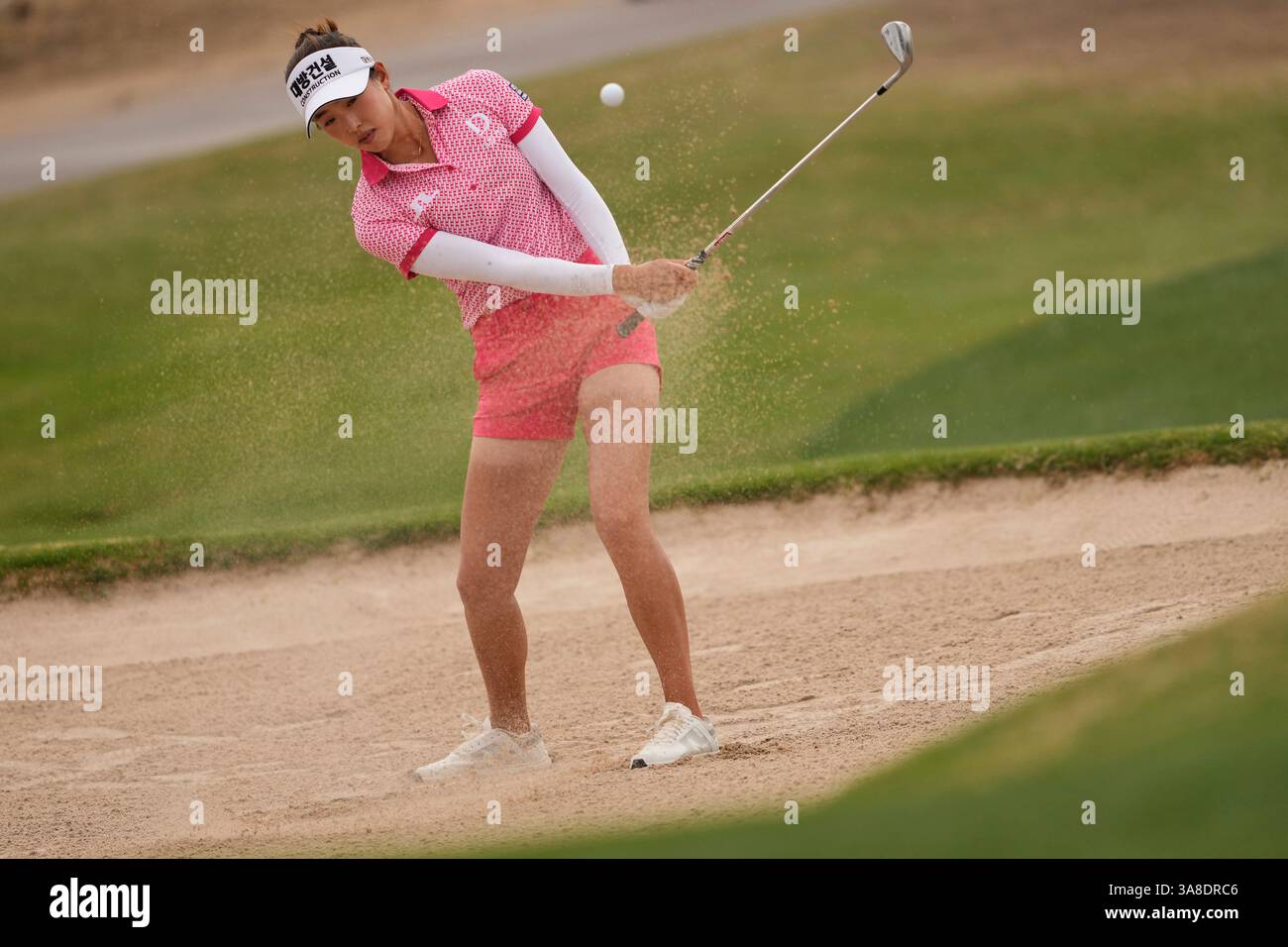 Amy Yang, of South Korea, hits from the bunker on the seventh green during the second round of ...