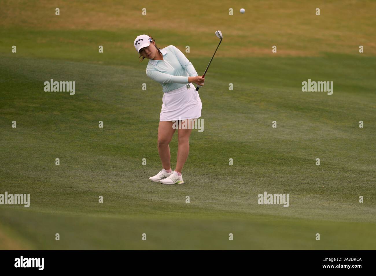 Mary Liu, of China, hits form the seventh fairway during the second ...