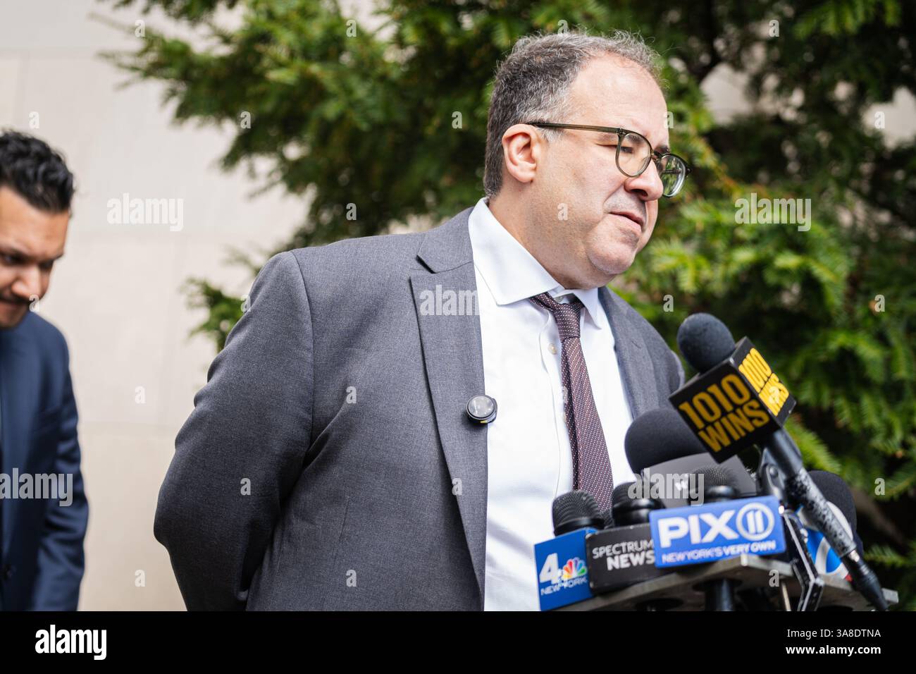 Newark, USA. 28th Mar, 2025. Defense lawyer Baher Azmy spoke to ...