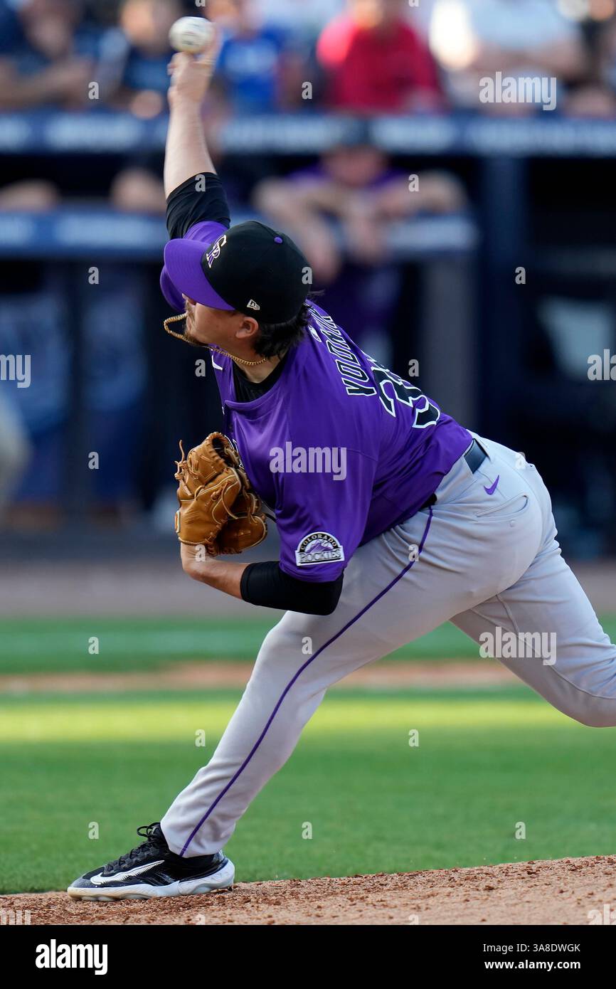 Colorado Rockies pitcher Victor Vodnik delivers to the Tampa Bay Rays ...