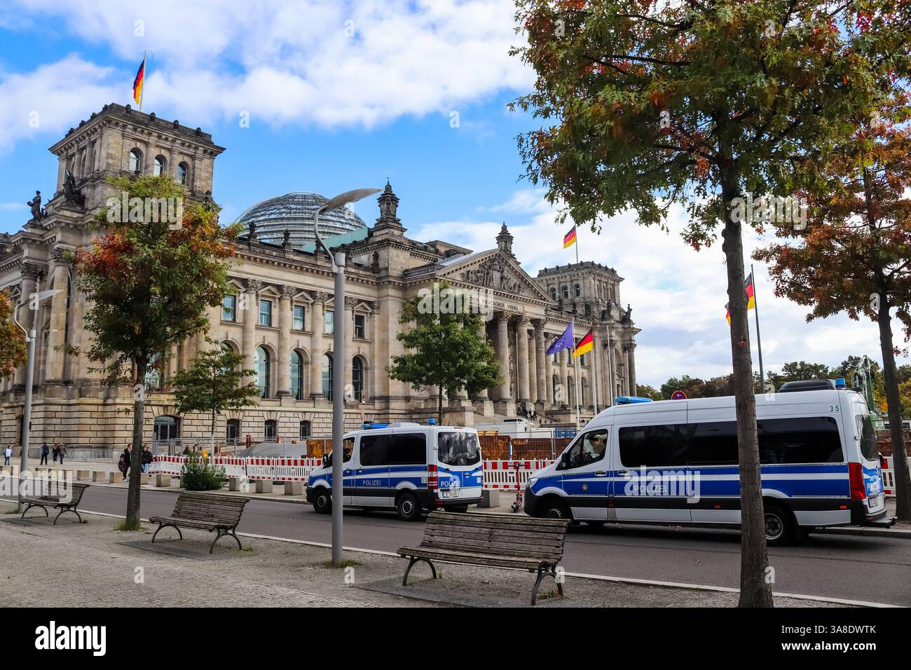German police vans parked near the Reichstag Building in Berlin with ...