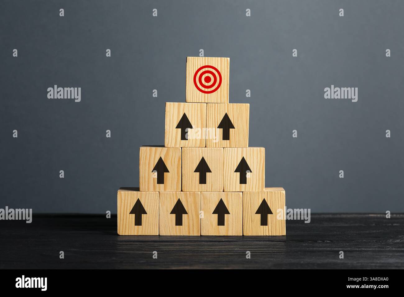 Targeting. Pyramid of cubes with arrows pointing at one with bullseye ...