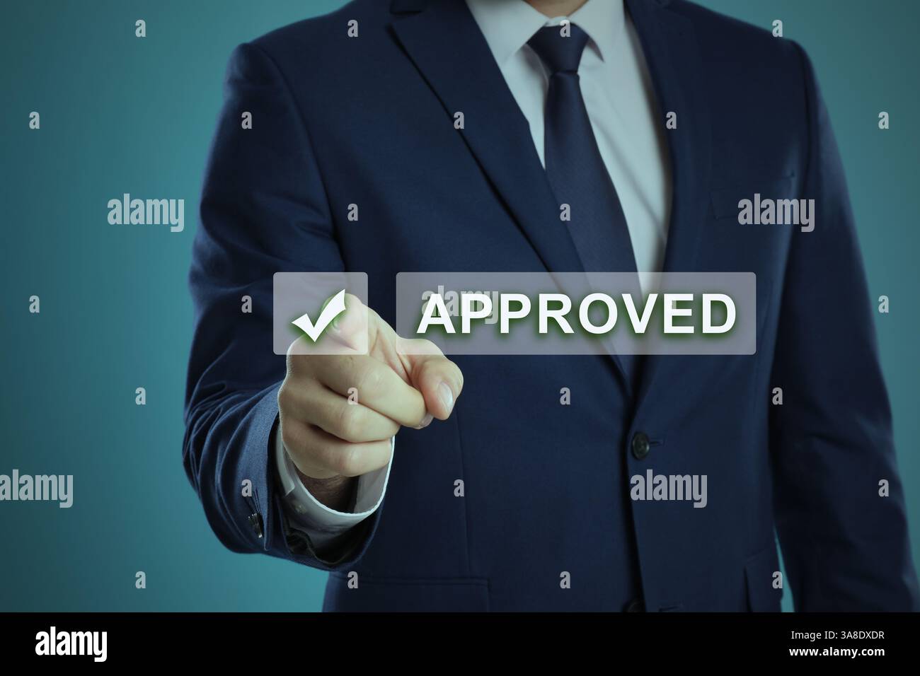 Businessman touching button Approve on virtual screen against light ...