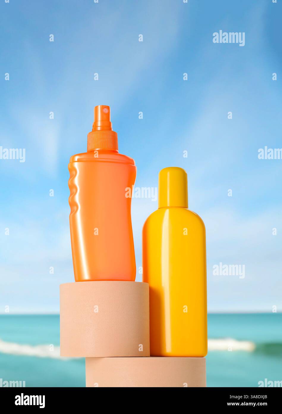 Sunscreen products on beach near ocean. Stylish presentation with ...