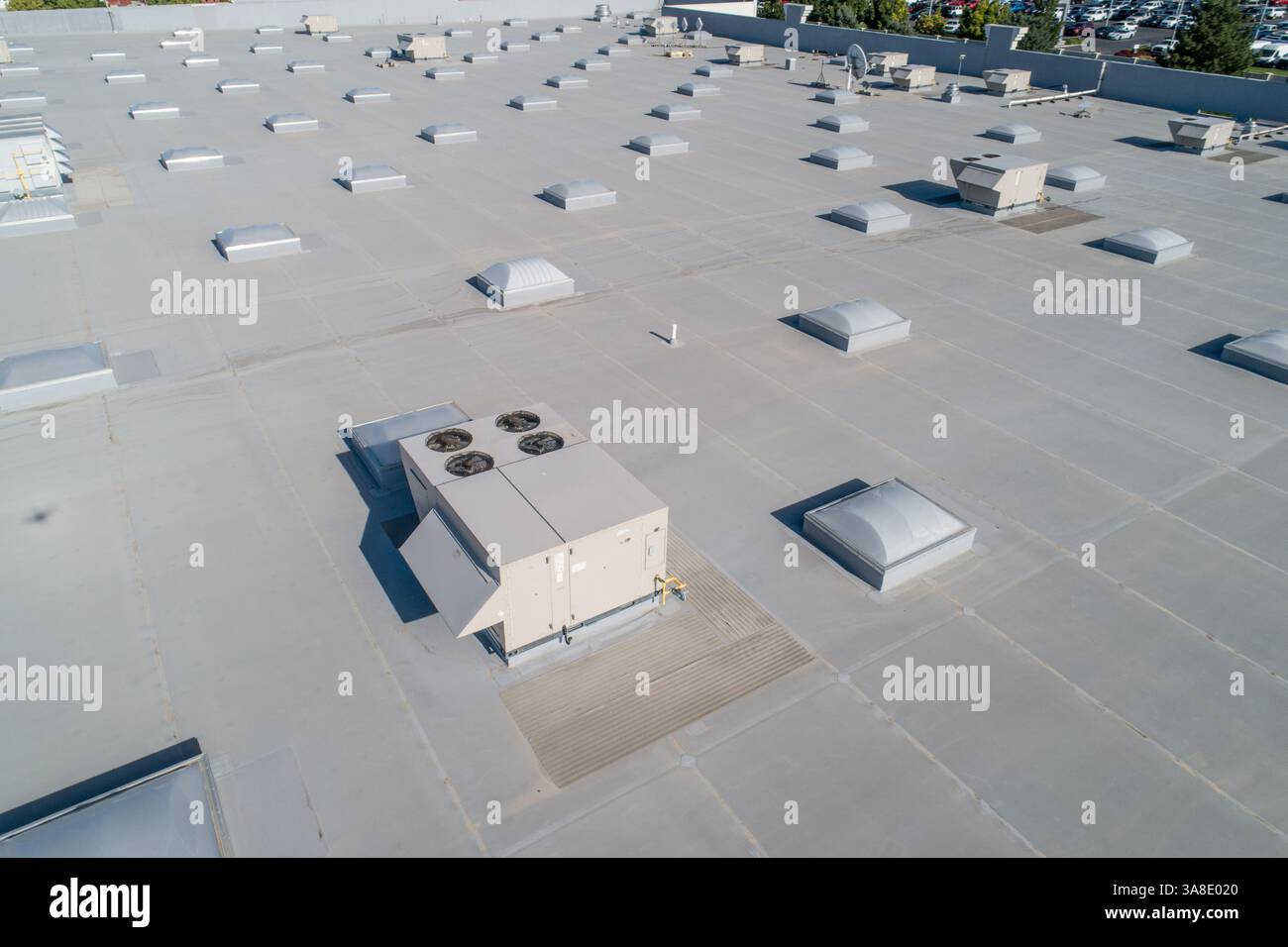 A large building with many vents and a large air conditioner. The vents ...