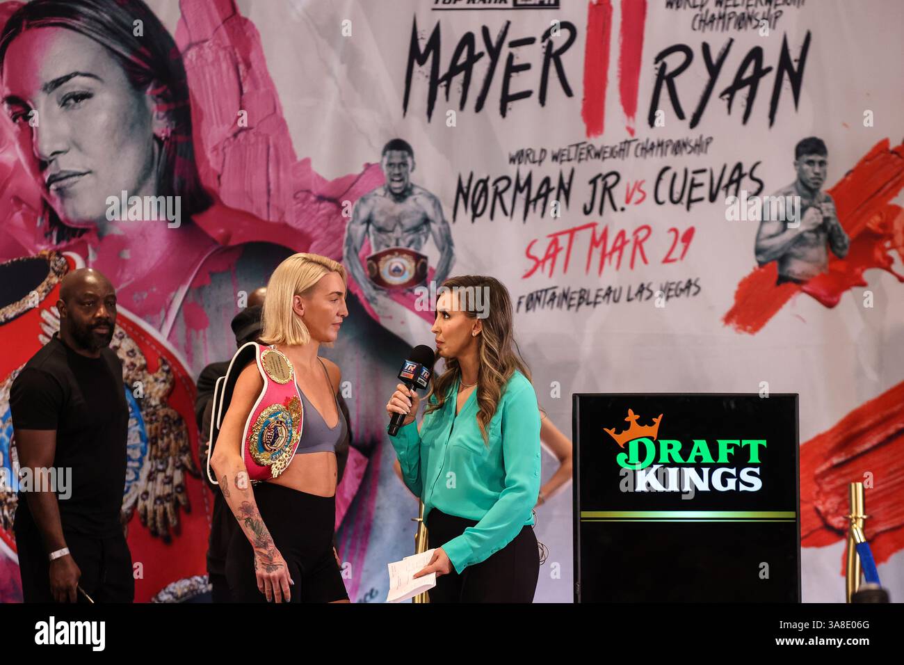 March 28, 2025: (L-R) Welterweight Mikaela Mayer speaks with ...