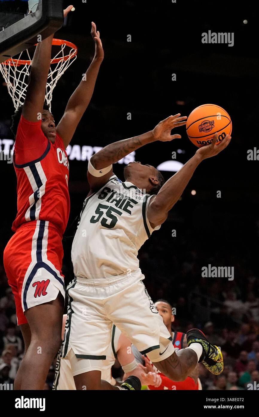 Michigan State forward Coen Carr (55) shoots against Mississippi ...