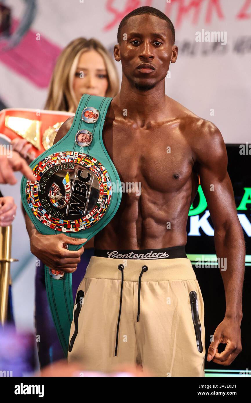 March 28, 2025: Featherweight Bruce Carrington poses on the stage during weigh-ins inside the ...