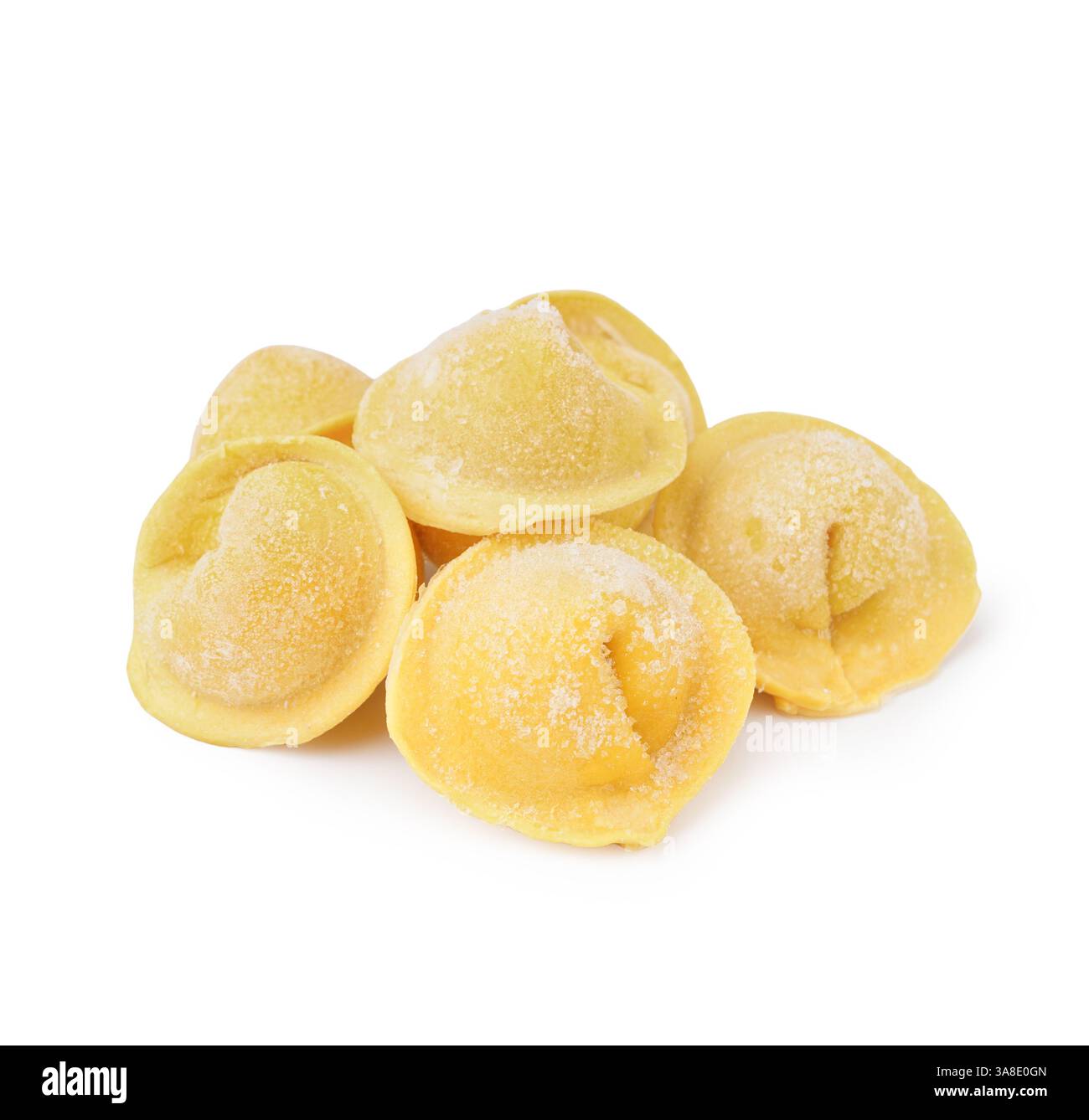 Yellow raw dumplings on white background Stock Photo - Alamy