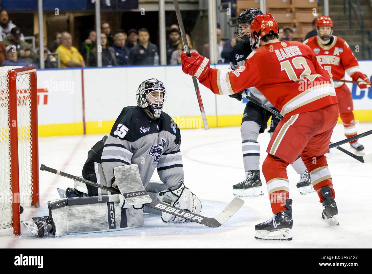 Denver forward Sam Harris (12) celebrates after a scoring a goal on ...