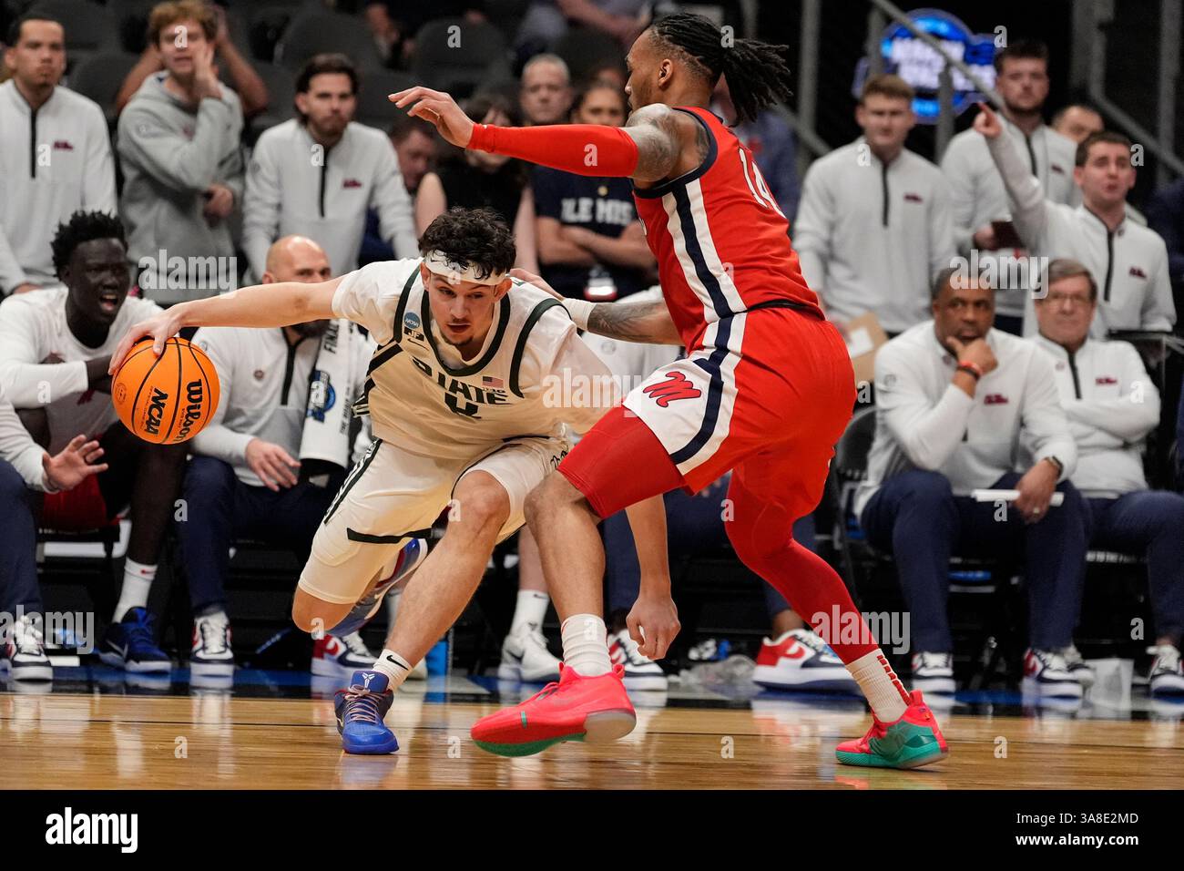 Michigan State forward Jaxon Kohler (0) drives against Mississippi ...