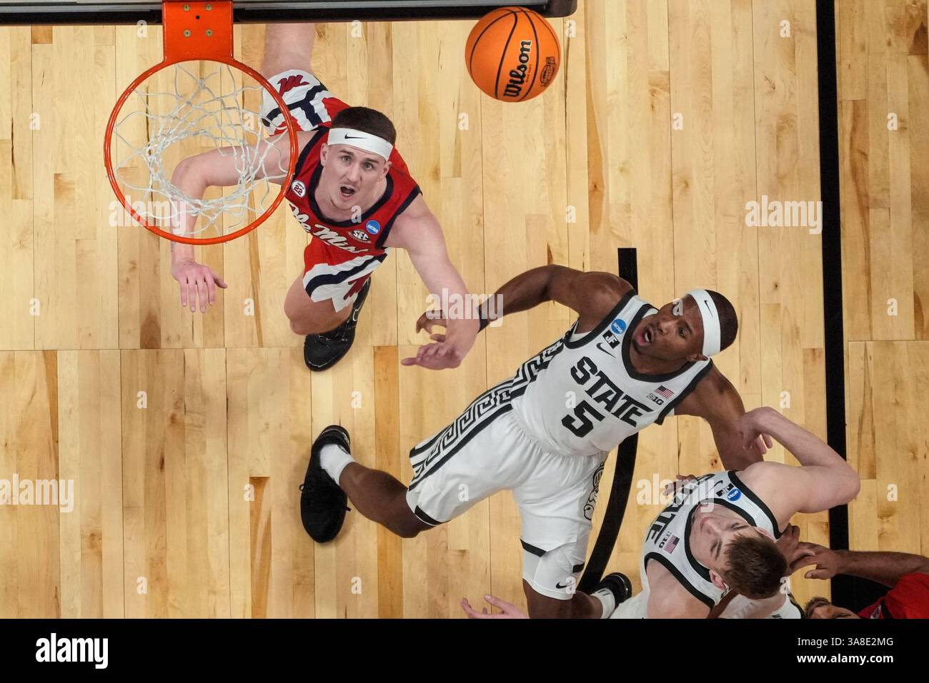 Michigan State guard Tre Holloman (5) shoots against Mississippi during ...