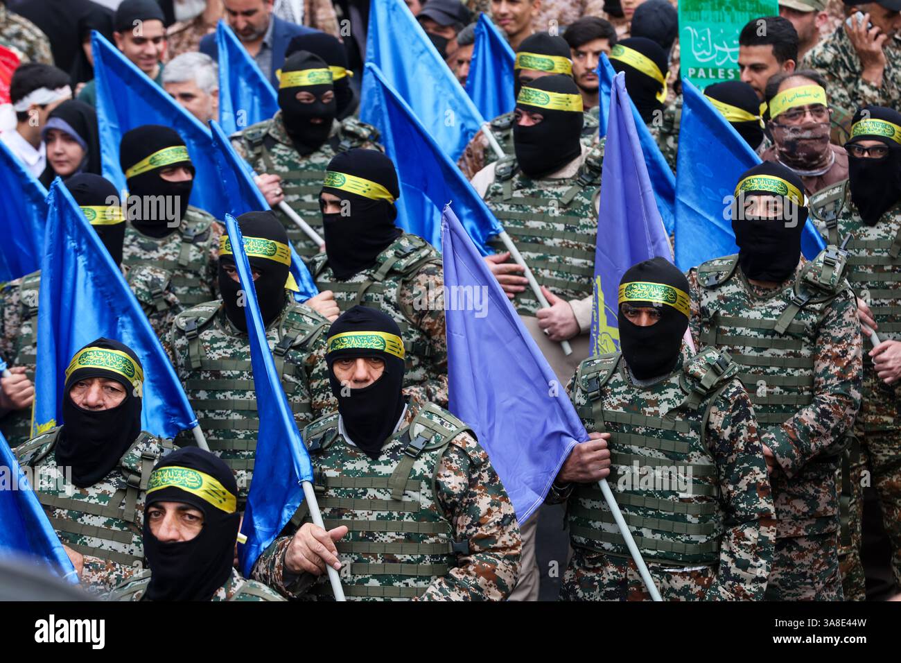 Tehran, Iran. 28th Mar, 2025. Members of the Iranian Basij paramilitary ...