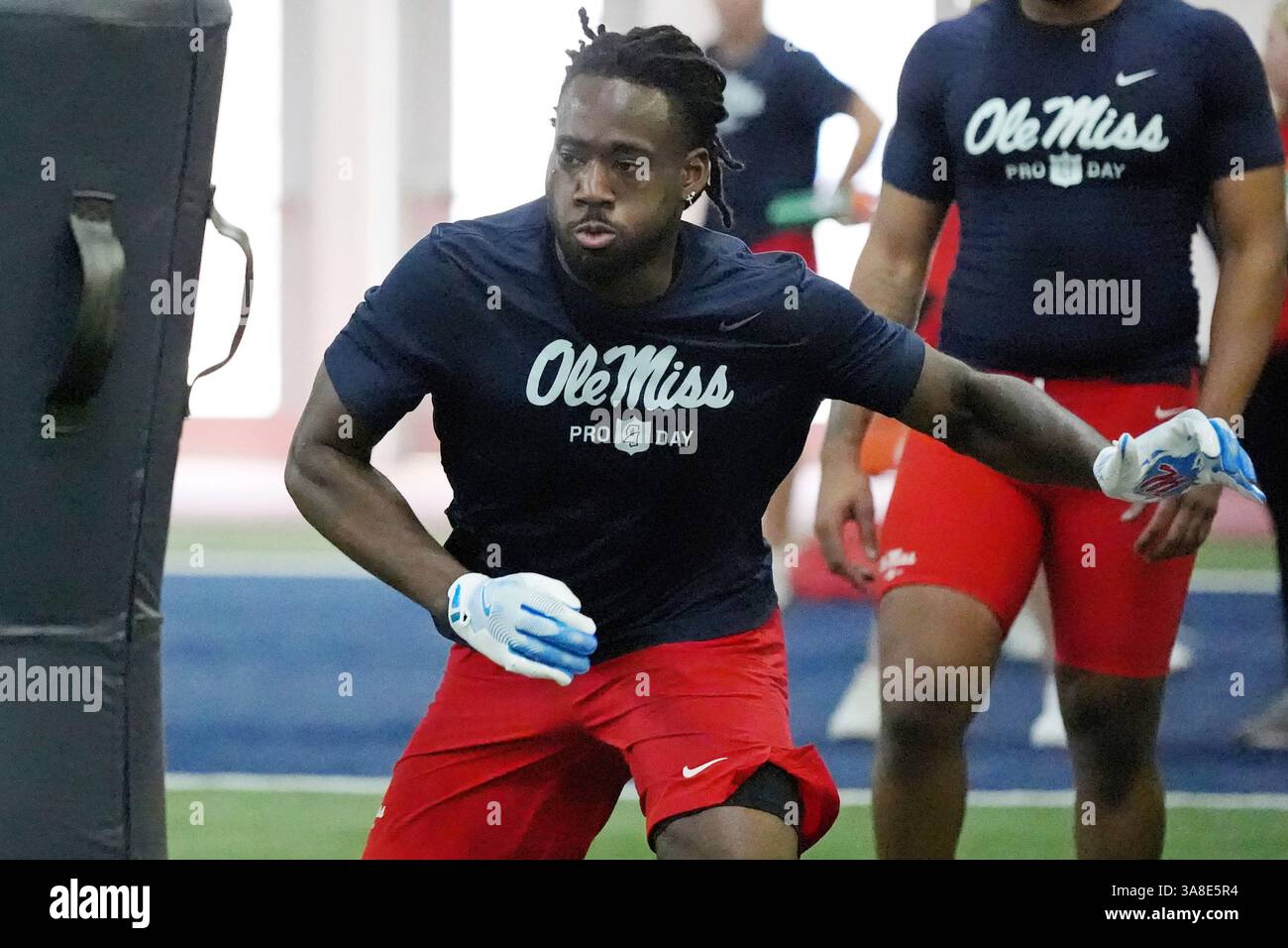 Mississippi defensive end Princely Umanmielen confronts a blocking ...