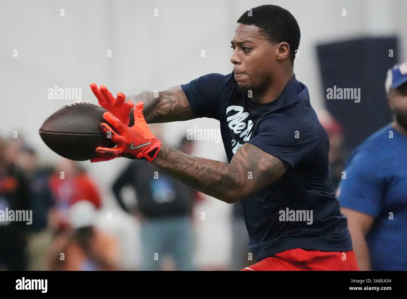 Mississippi linebacker Chris Paul Jr. catches a pass during a drill at ...
