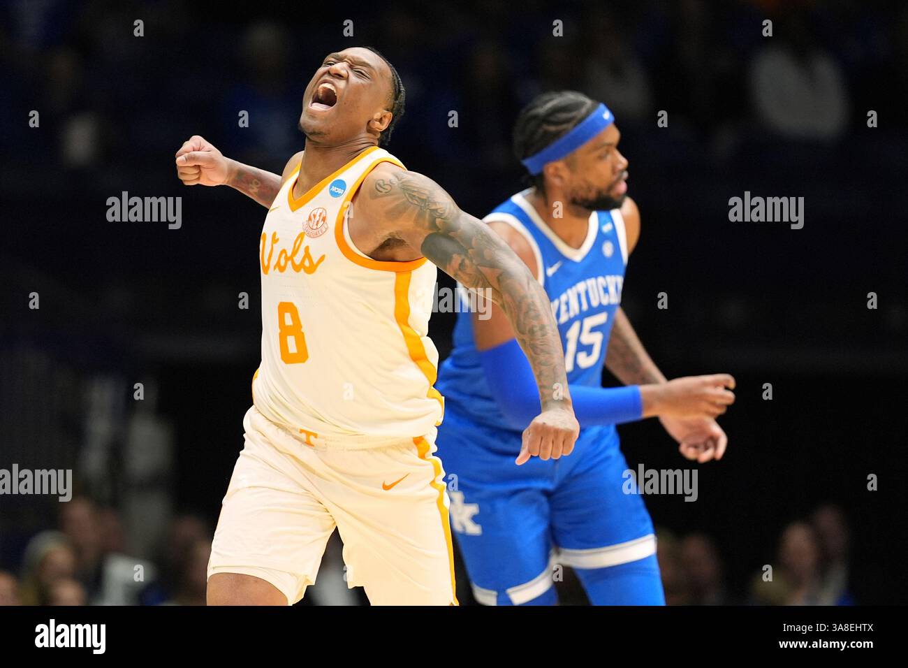 Tennessee's Darlinstone Dubar (8) celebrates alongside Kentucky's ...