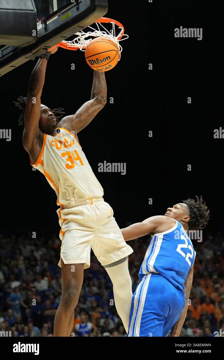 Tennessee's Felix Okpara (34) dunks over Kentucky's Amari Williams (22 ...