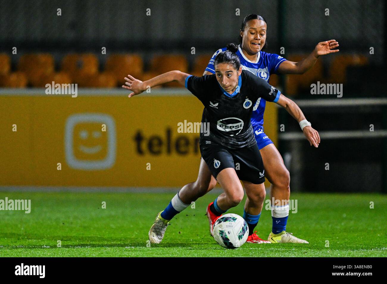 Gent, Belgium. 28th Mar, 2025. Rania Boutiebi (11) of Club YLA and Lina ...