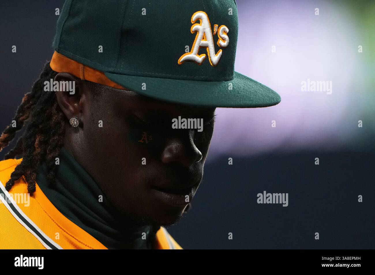 Athletics right fielder Lawrence Butler jogs off the field during an ...