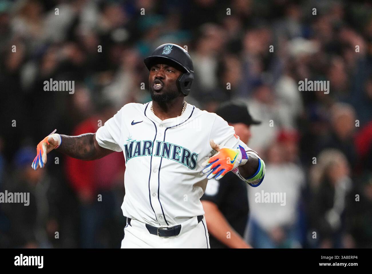 Seattle Mariners' Randy Arozarena reacts after hitting a home run ...