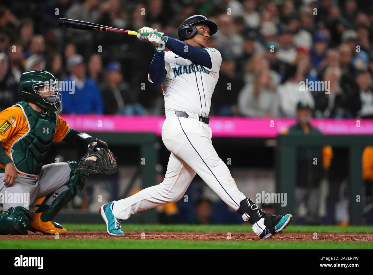 Seattle Mariners' Jorge Polanco looks on after hitting a two-run home ...