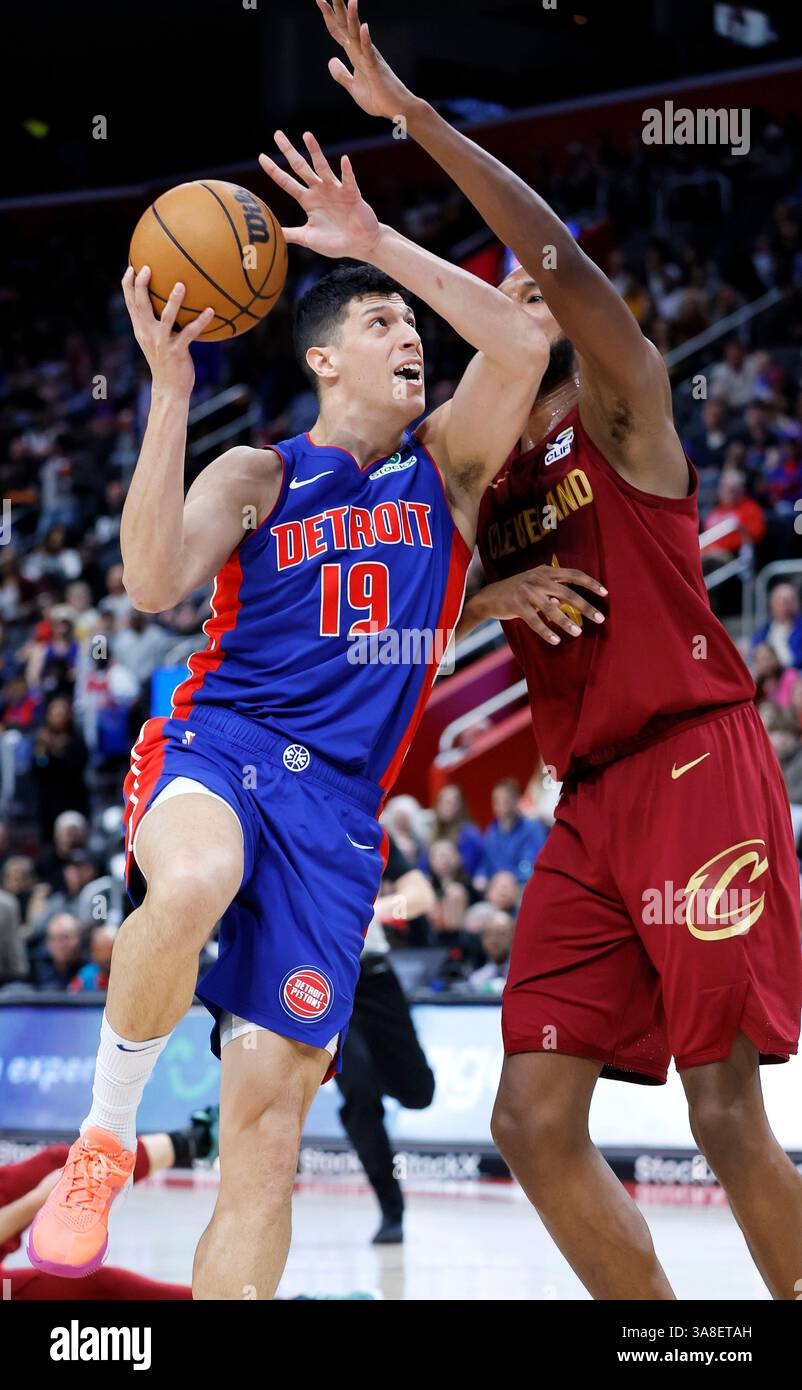 Detroit Pistons forward Simone Fontecchio (19) looks to shoot against Cleveland Cavaliers ...