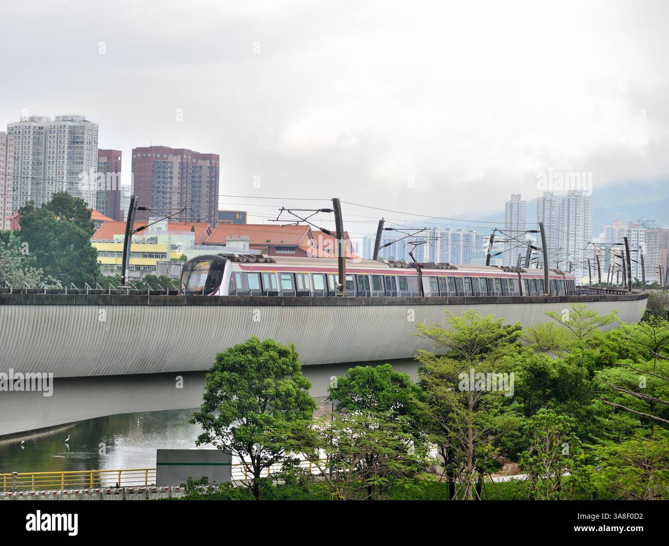 Train running on river hi-res stock photography and images - Alamy