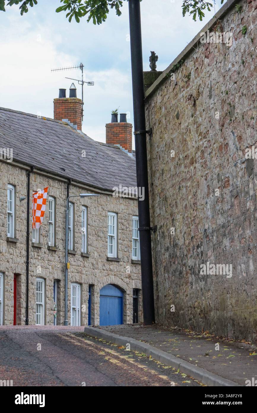 Castle Street Armagh stone wall and row of terrace houses. Street city ...
