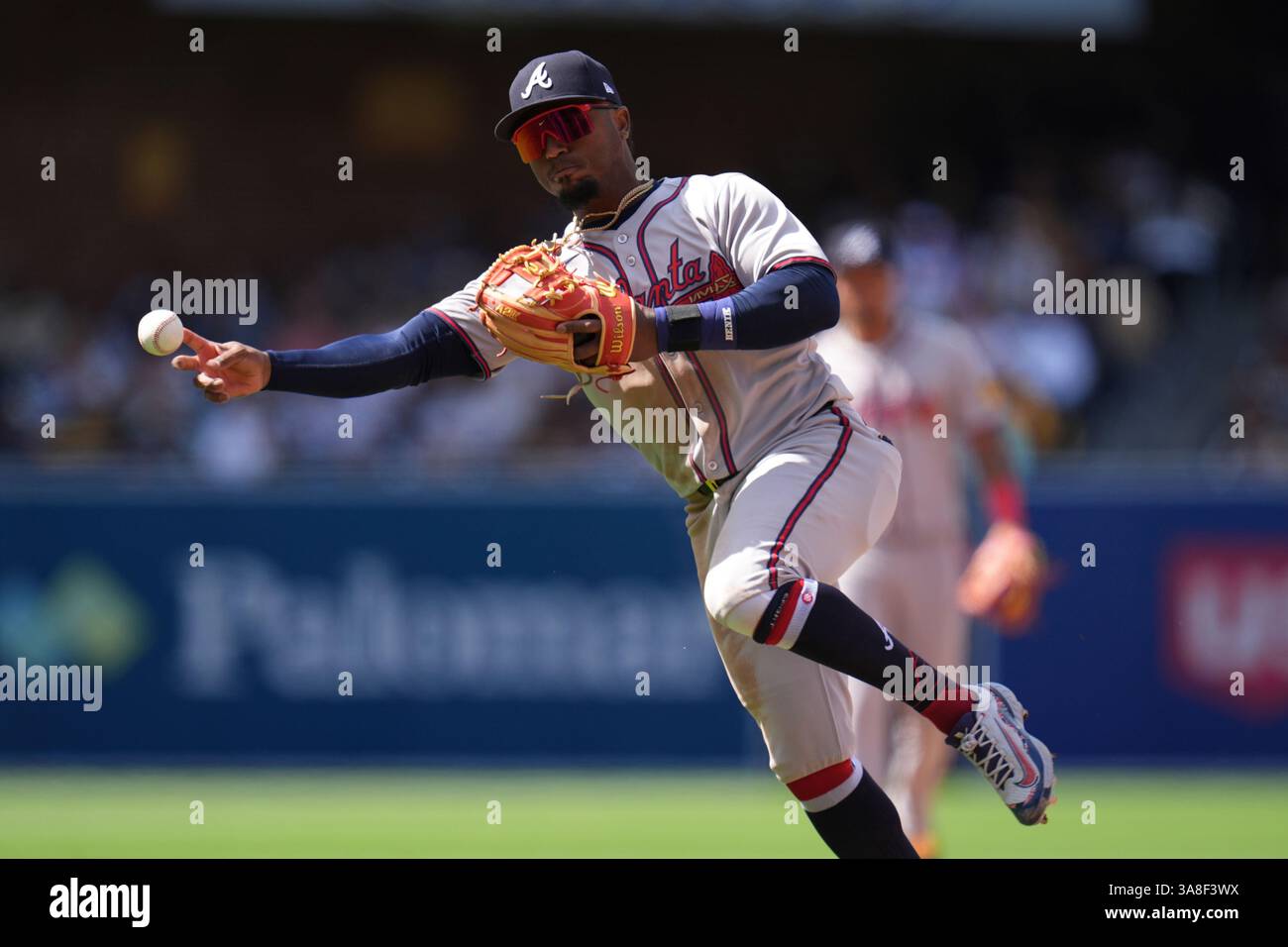 Atlanta Braves second baseman Ozzie Albies throws to first of an ...