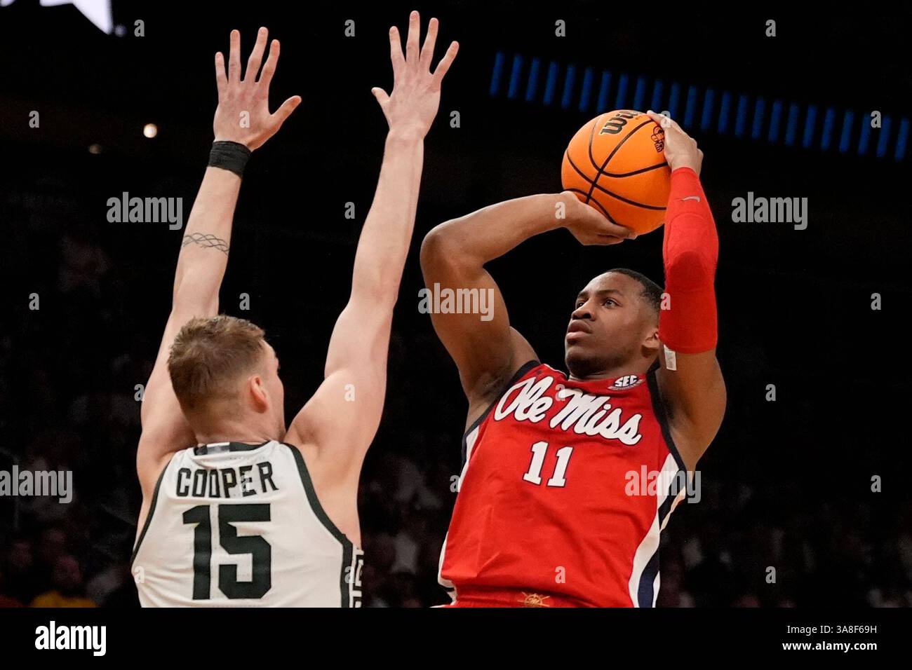 Mississippi guard Matthew Murrell (11) shoots against Michigan State ...