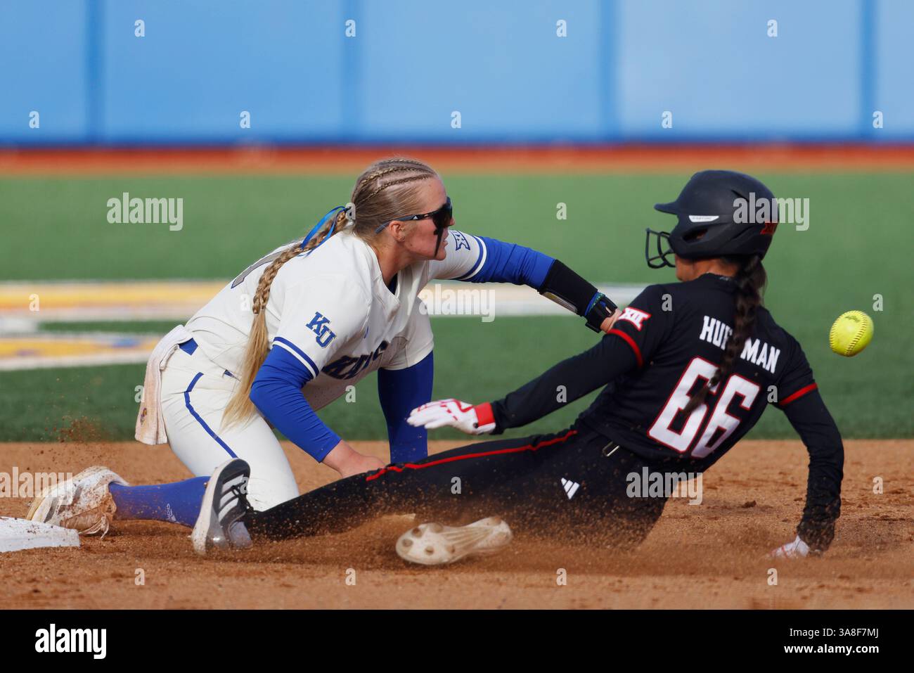 Texas Tech's Kiley Huffman (66) is safe with a double as Kansas ...