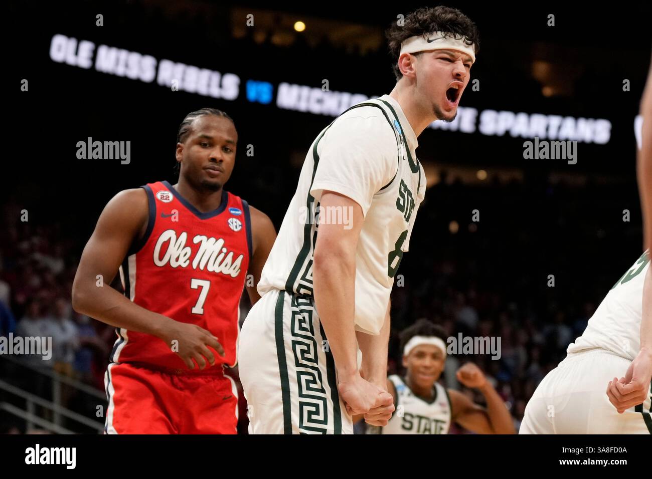 Michigan State forward Frankie Fidler (8) reacts to play against ...