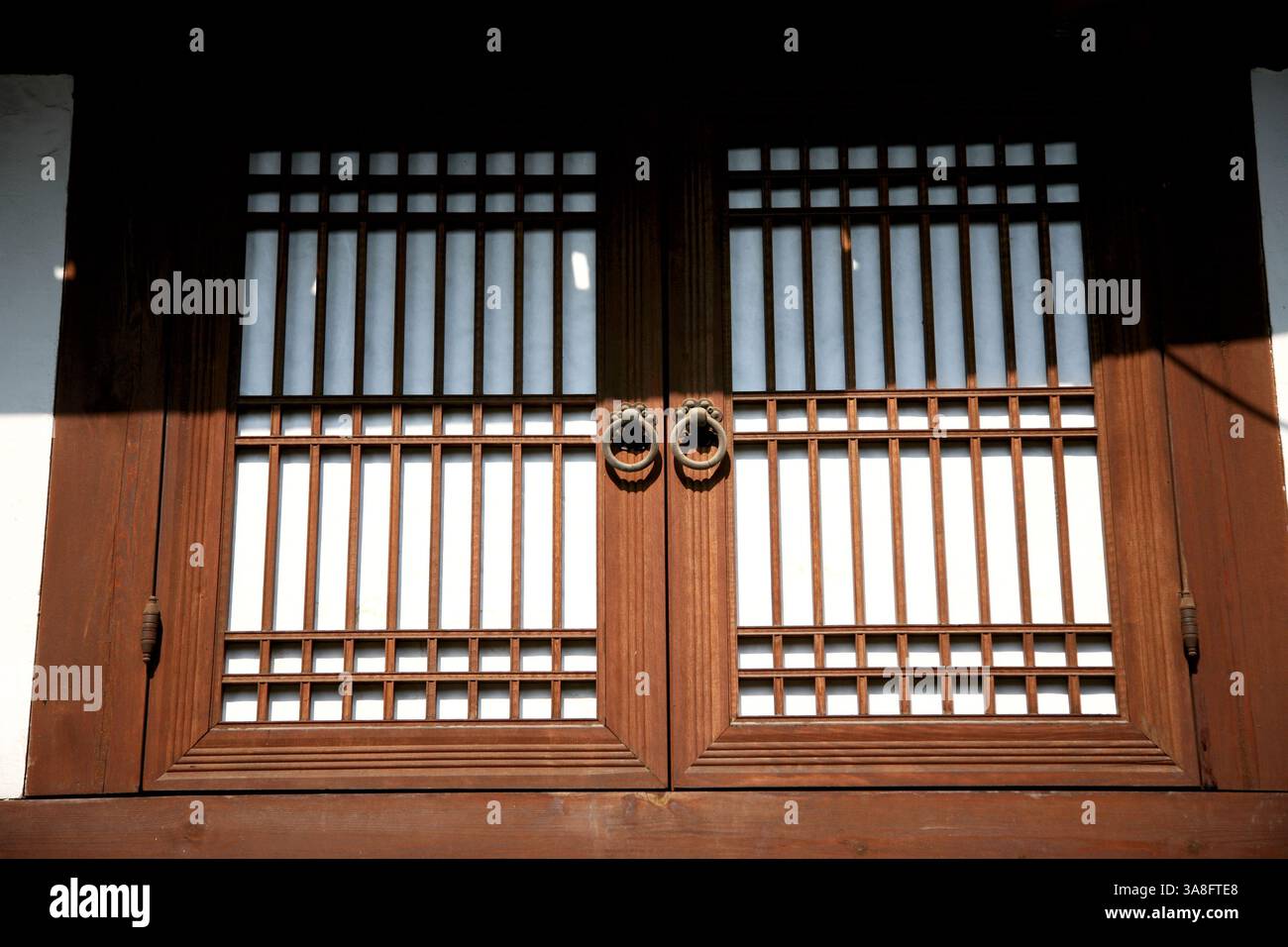 Traditional wooden lattice window with hanji paper in Bukchon Hanok ...