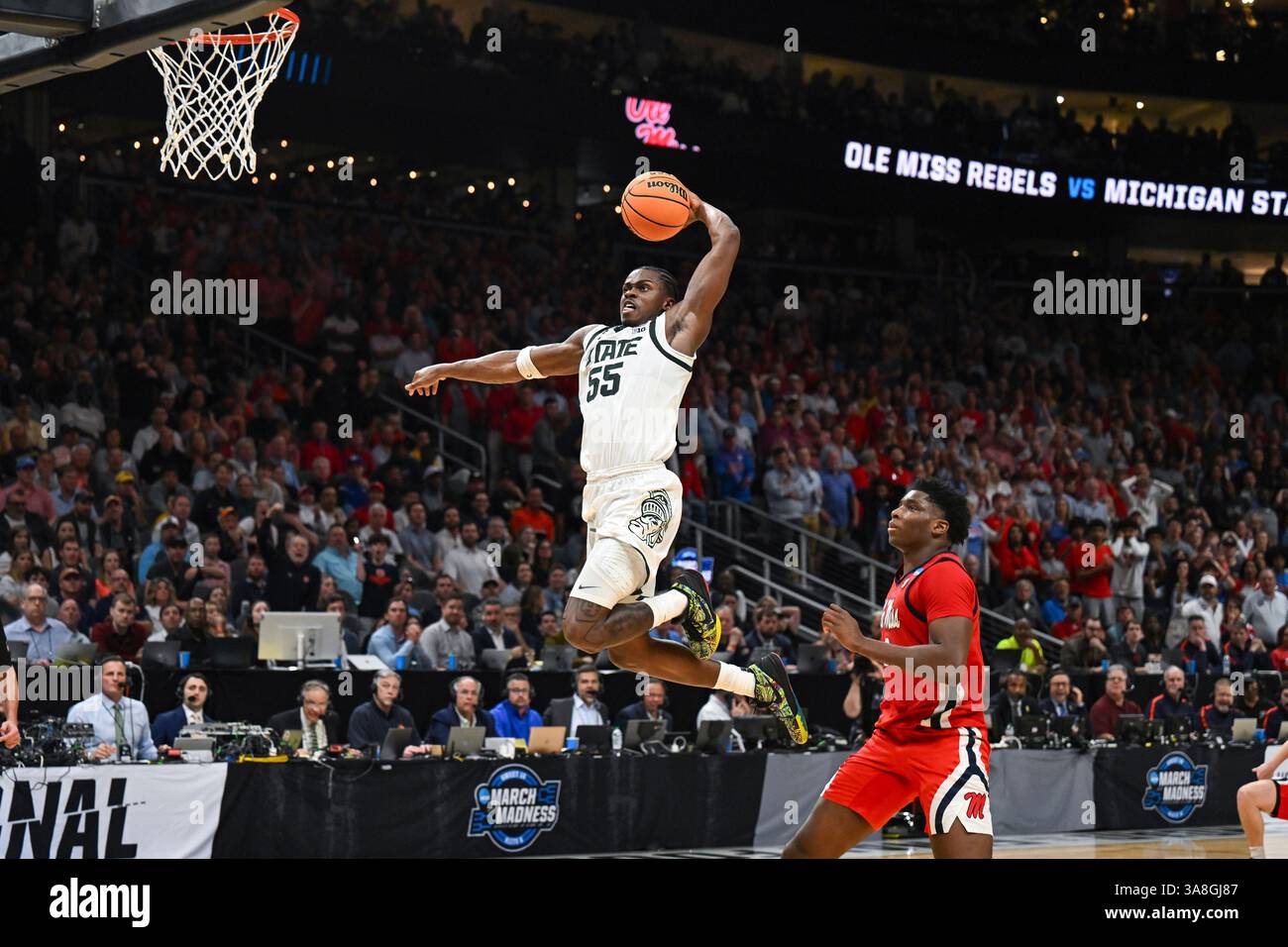 ATLANTA, GA – MARCH 28: Michigan State forward Coen Carr (55) drives in ...