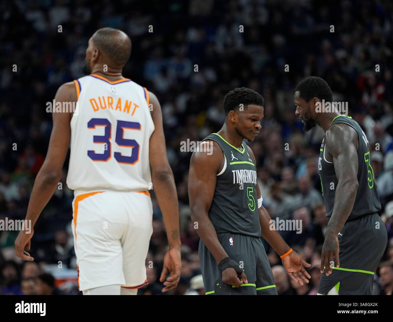 Minnesota Timberwolves forward Julius Randle (30), right, celebrates ...