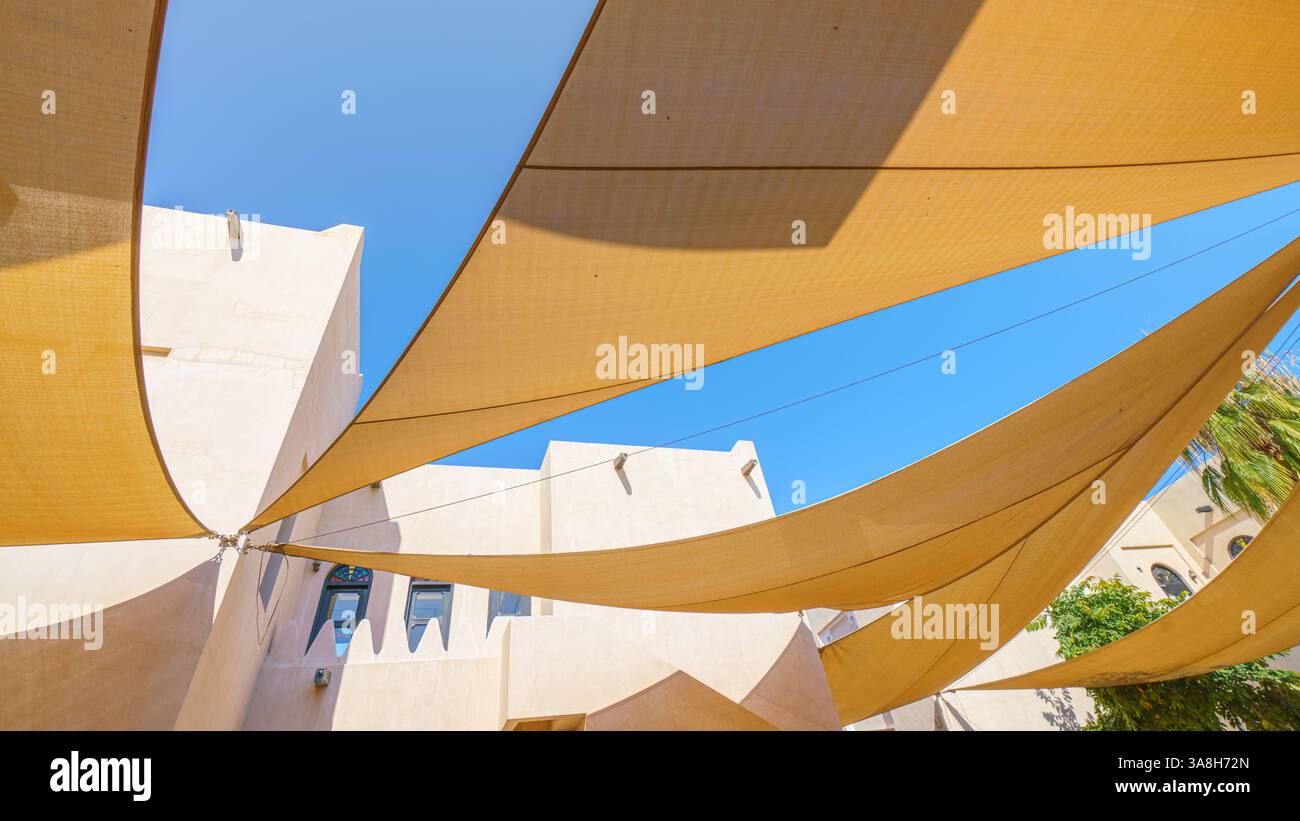 Doha, Qatar- Jan 14 2024, 4k, Bottom-up view of several triangular ...