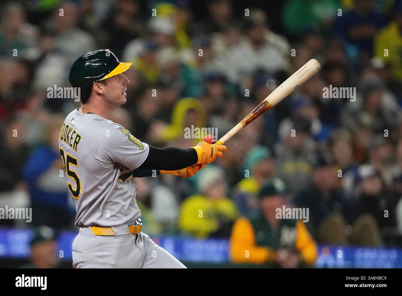 Athletics designated hitter Brent Rooker follows through on a two-run ...