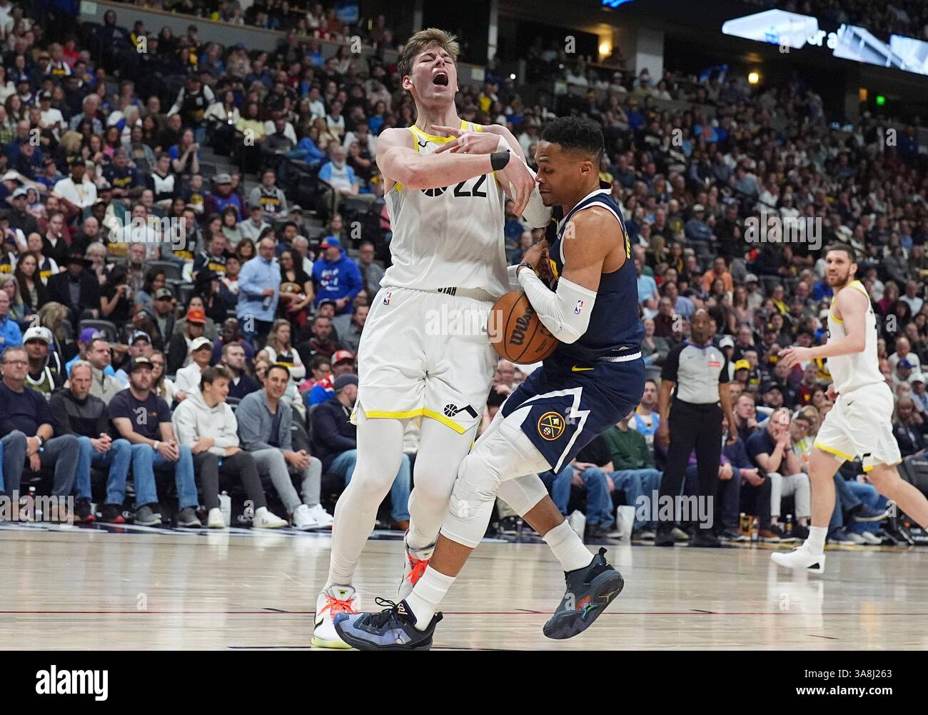 Denver Nuggets guard Russell Westbrook, center right, steals the ball ...