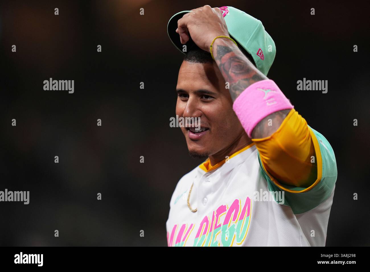 San Diego Padres third baseman Manny Machado jokes with teammates as he ...