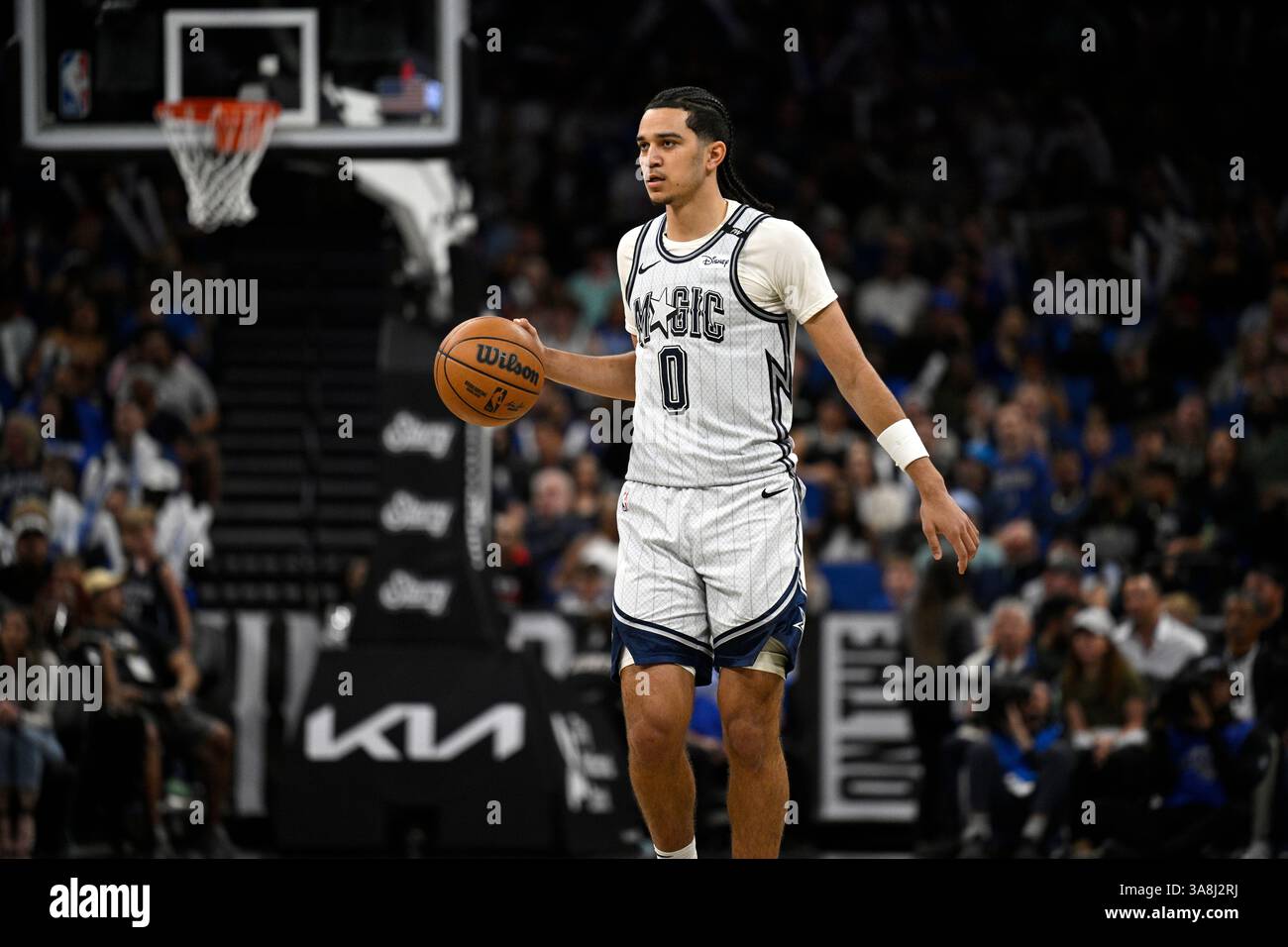 Orlando Magic guard Anthony Black (0) brings the ball up the court ...