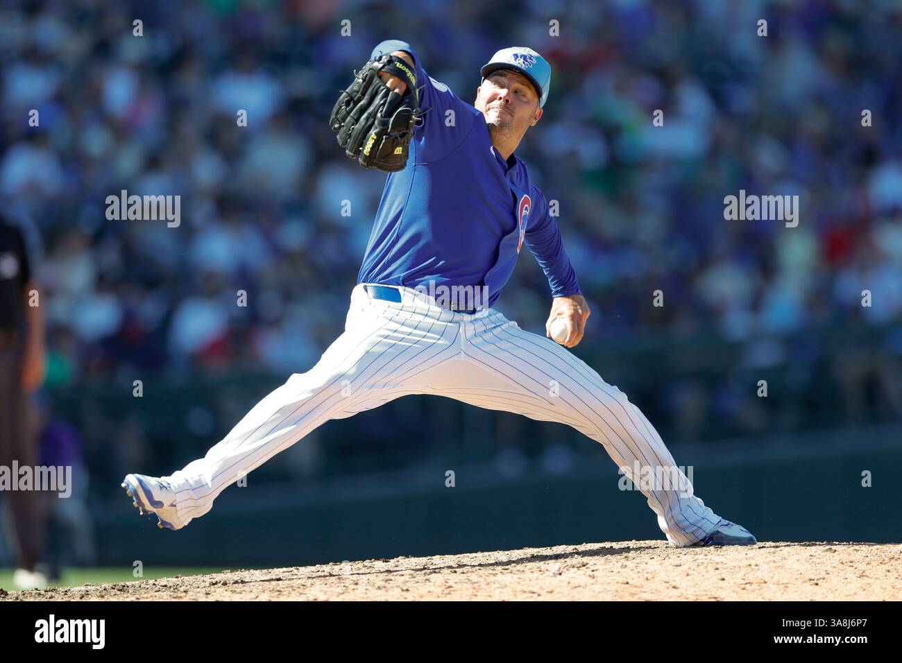 Mesa, AZ. USA; Chicago Cubs pitcher Caleb Thielbar (24) delivers a ...