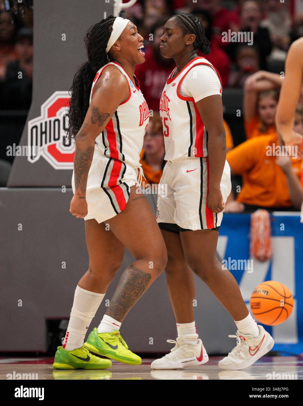 Ohio State's Cotie McMahon (32) celebrates with teammate Eboni Walker ...
