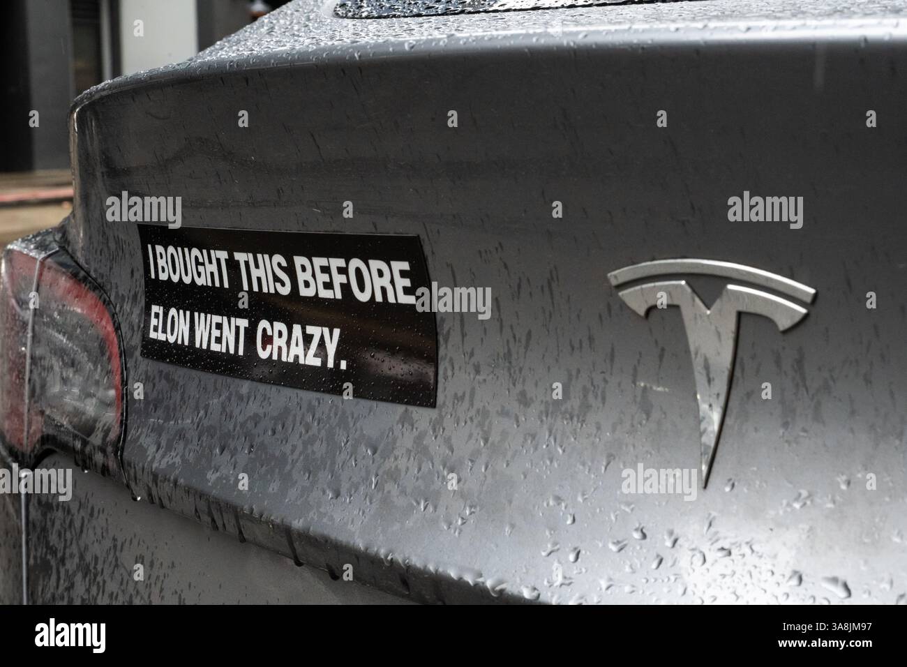 Seattle, USA. 28th Mar 2025. Anti - Elon Musk sticker seen on a Tesla ...
